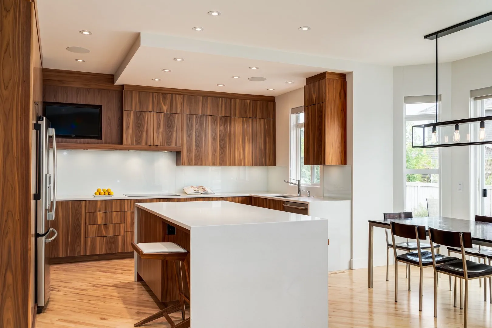 Contemporary Interior Design with Extensive Walnut Millwork