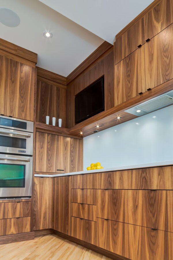 Contemporary Interior Design with Extensive Walnut Millwork