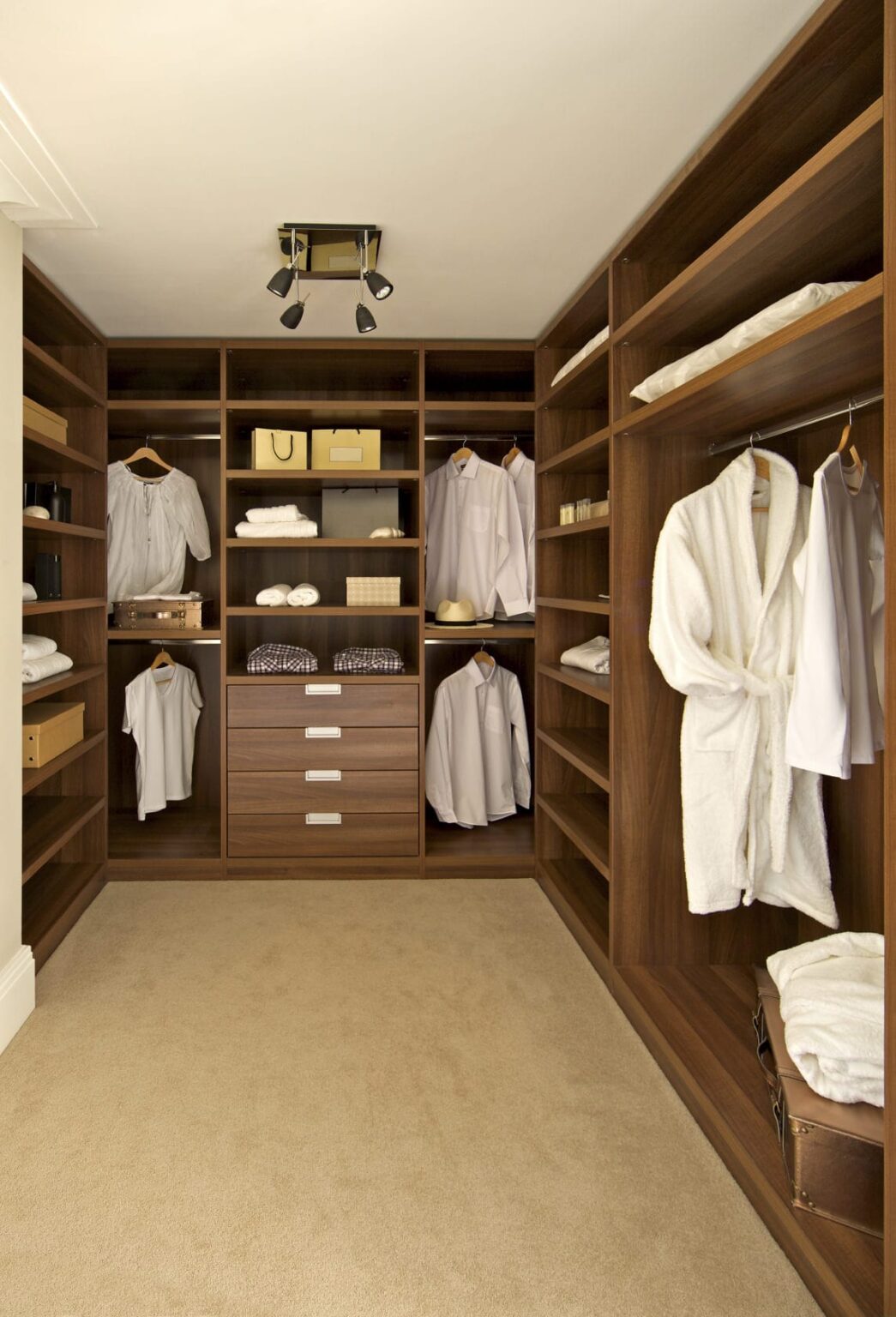 15 Dark & Luxurious Walk-In Closets for Men