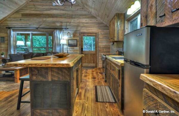The Perfect Hideaway: Tour This Charming 1-Bedroom Rustic Cabin Floor ...
