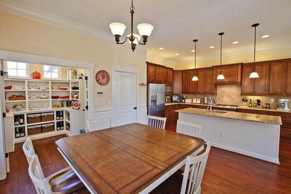 Tour This Inviting 4-Bedroom Tidy Cottage with Bold Red Shutters and an ...