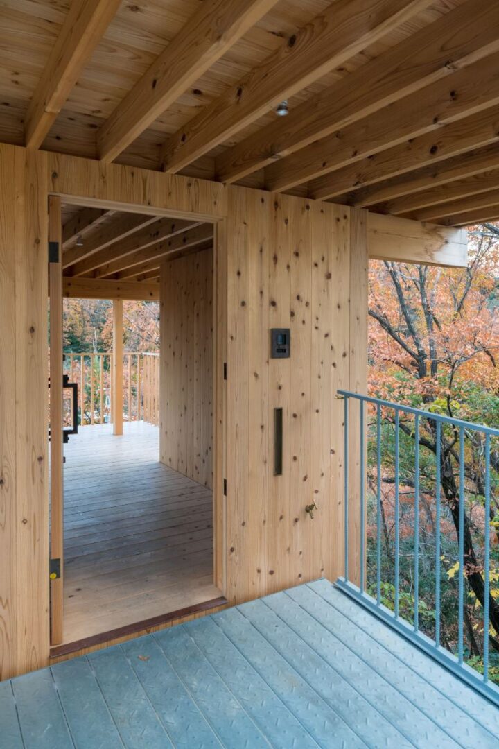 Incredible House Built Into the Side of a Cliff with a Driveway Bridge ...